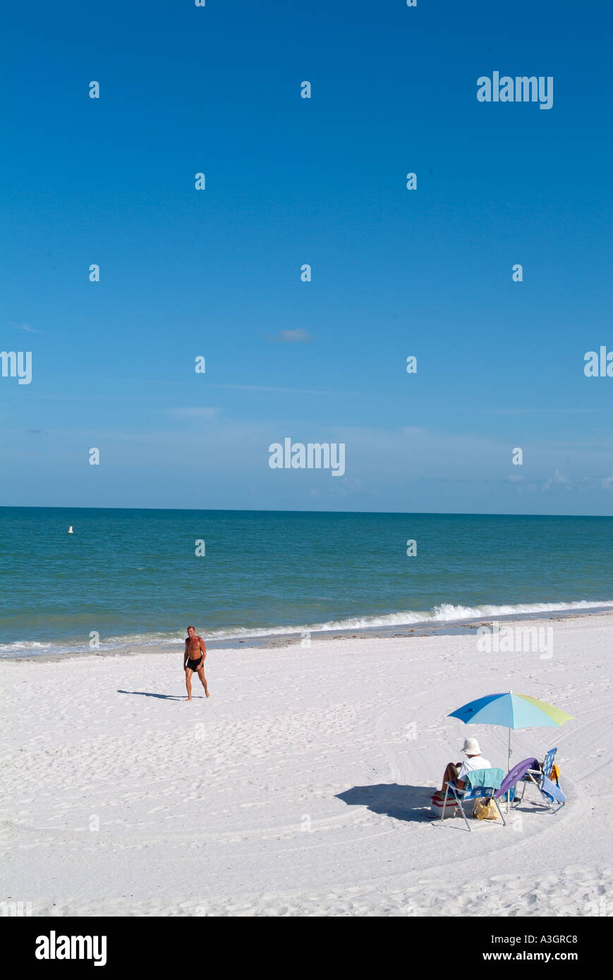 Naples Florida beach scene coastal shoreline beaches umbrella Stock ...