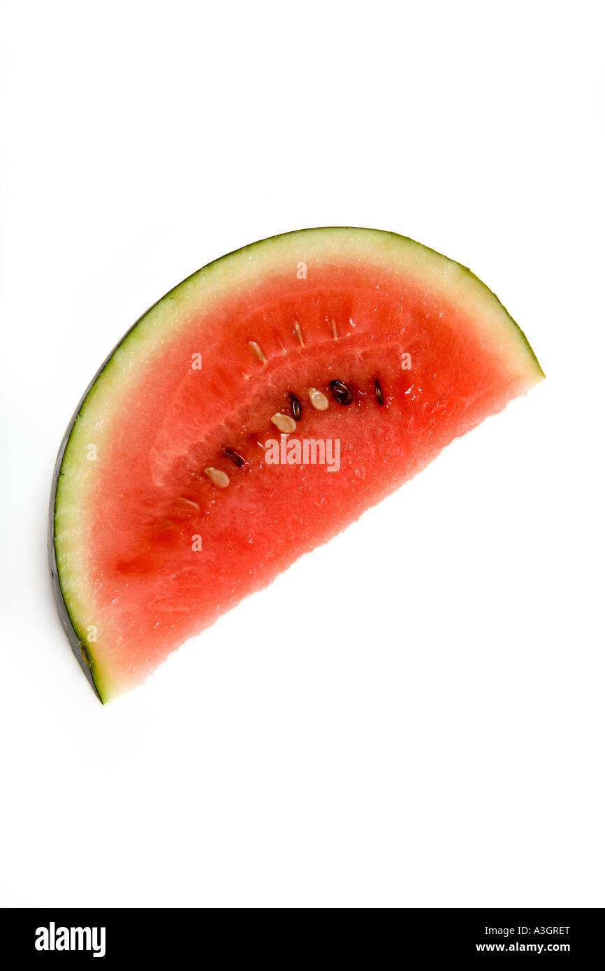Watermelon slice isolated on a white studio background Stock Photo - Alamy