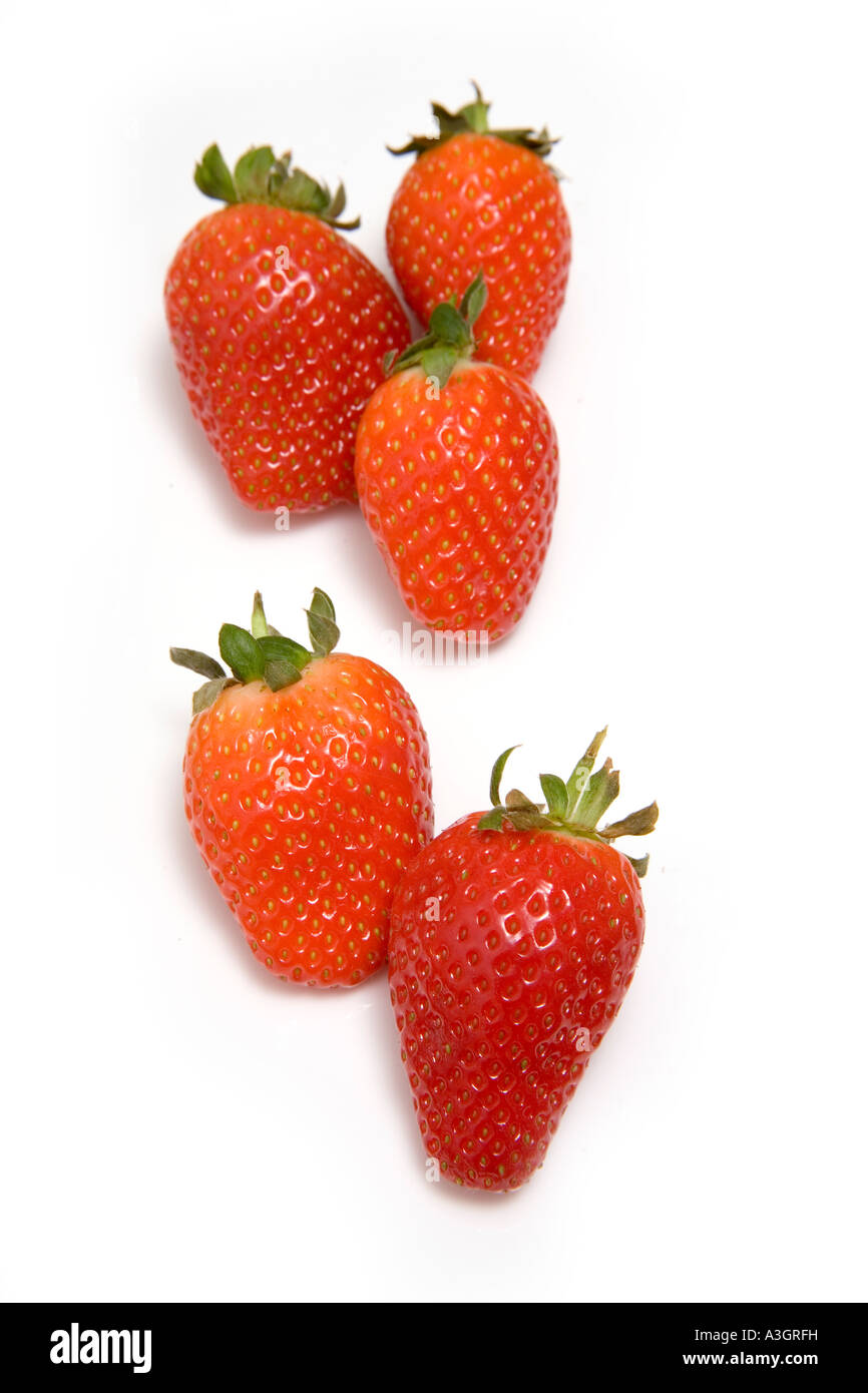 Strawberries isolated on a white studio background Stock Photo - Alamy
