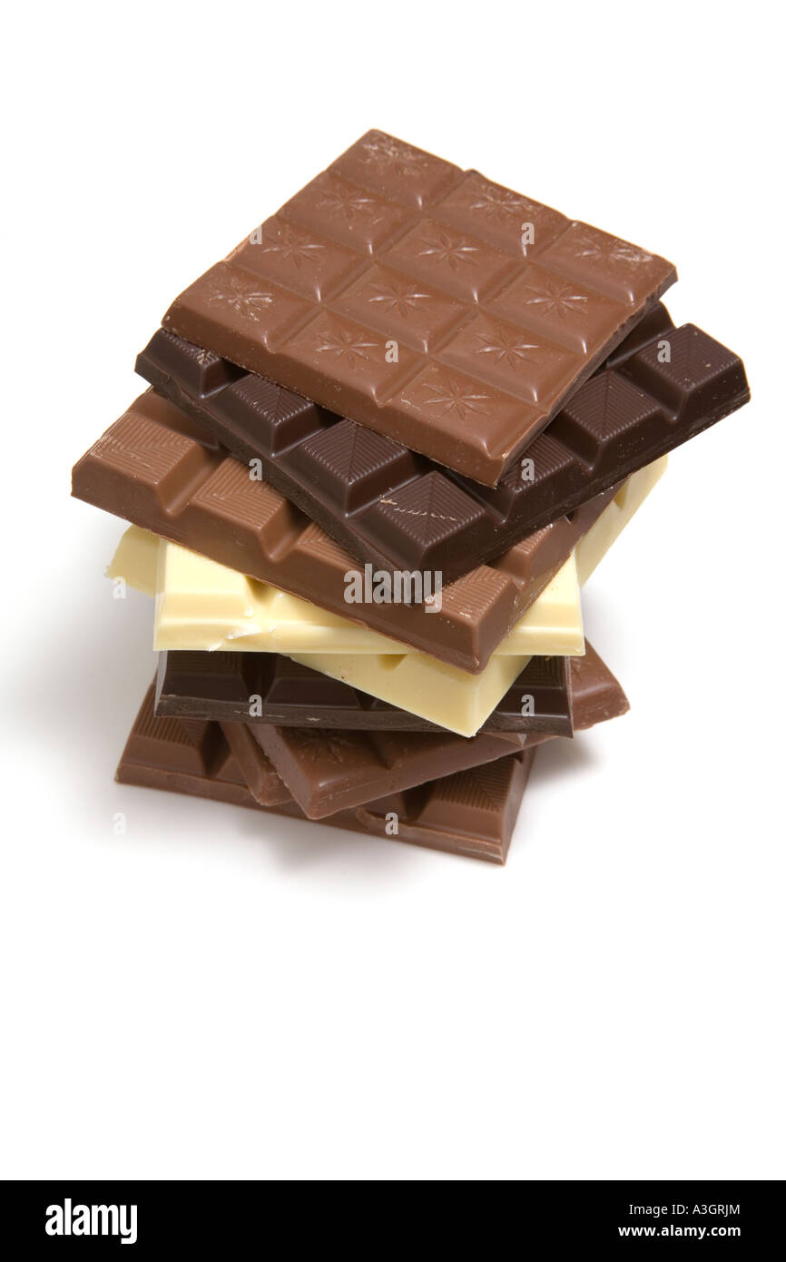 Chocolate slabs stacked on a white studio background Stock Photo - Alamy