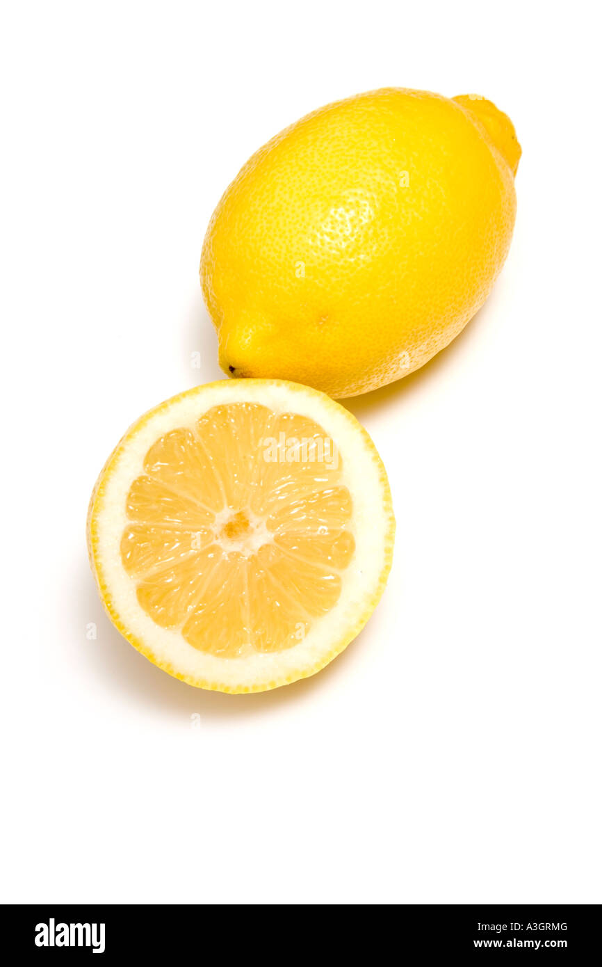 Lemon whole and halved isolated on a white studio background Stock ...