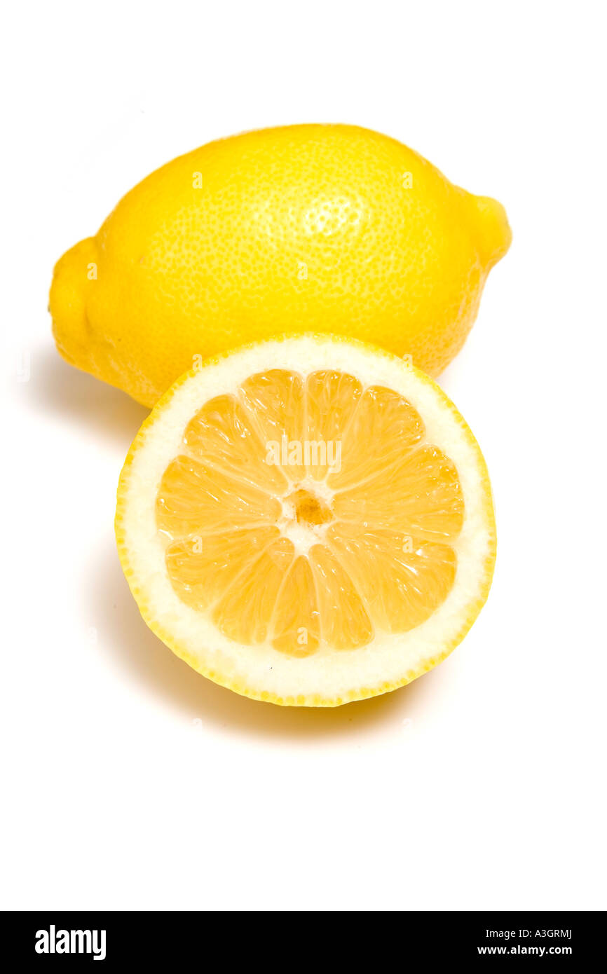 Lemon whole and halved isolated on a white studio background Stock ...