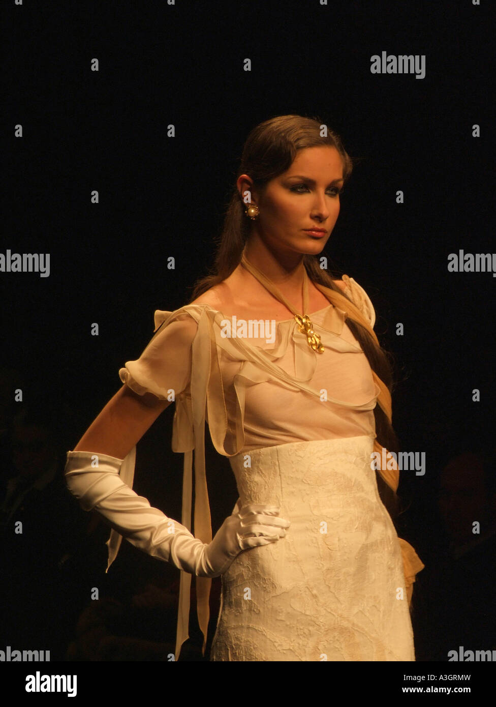 female model showing the camillo bona collection at a fashion show in ...