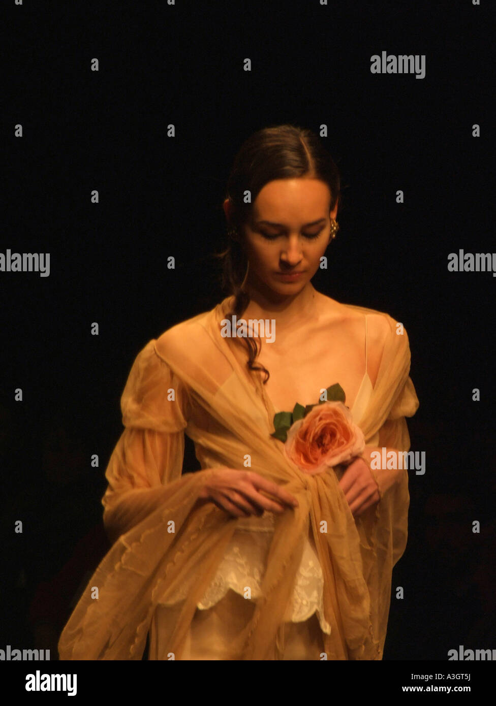 female model showing the camillo bona collection at a fashion show in ...