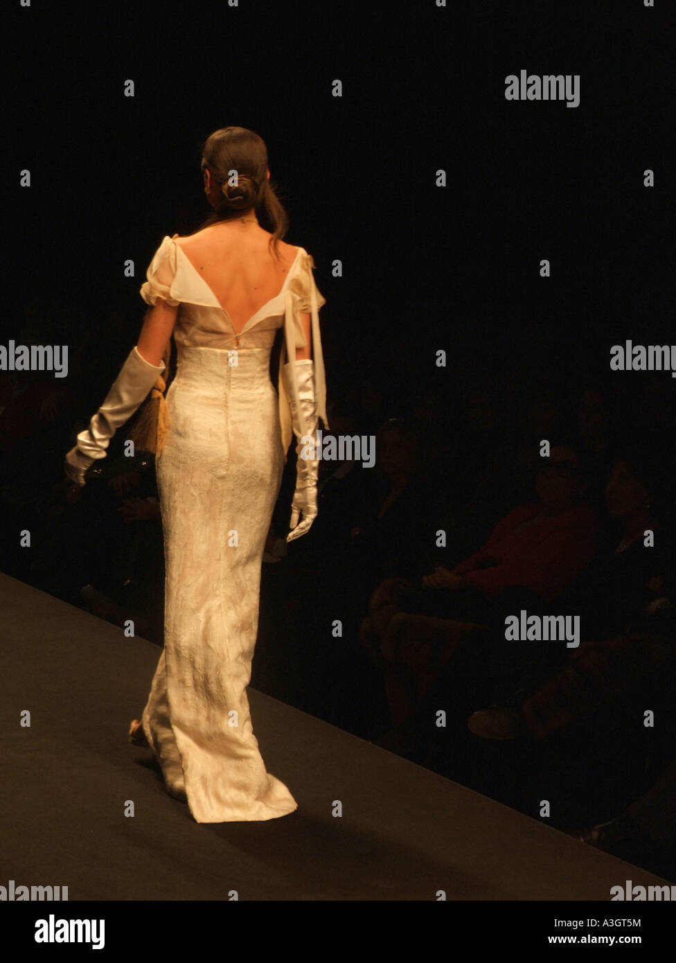 female model showing the camillo bona collection at a fashion show in ...