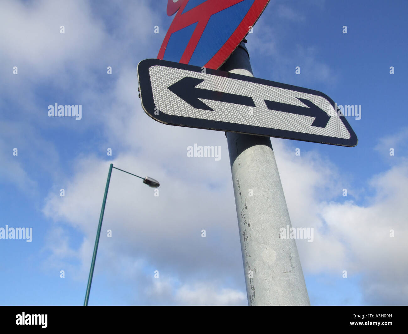 road traffic sign with two arrows Stock Photo - Alamy