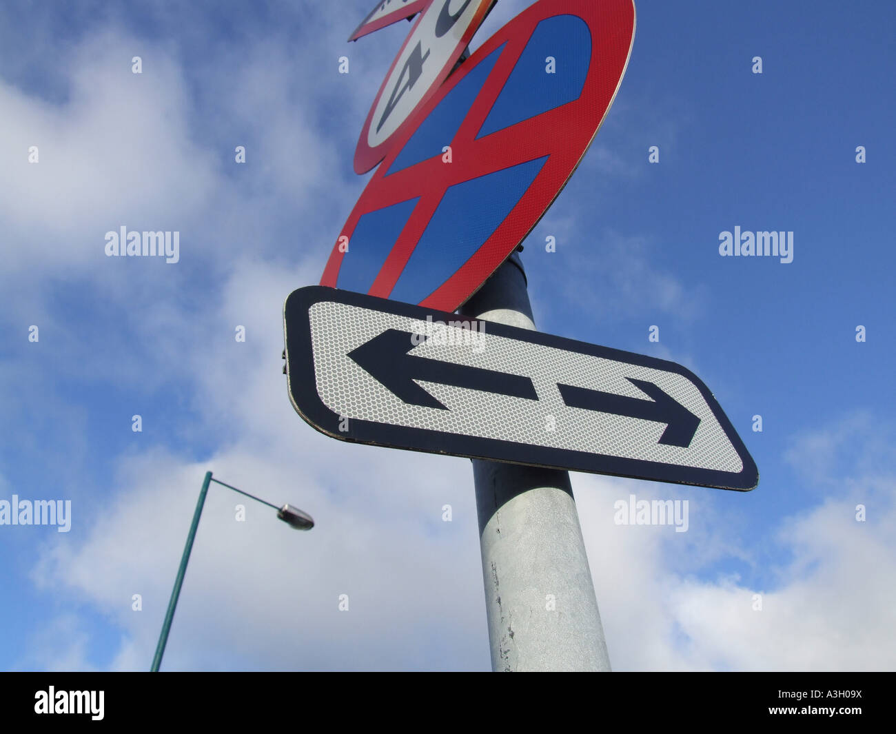 road traffic sign with two arrows Stock Photo - Alamy