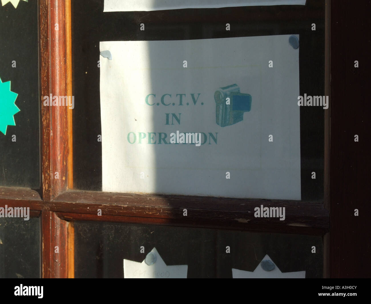 cctv sign in shop window Stock Photo - Alamy