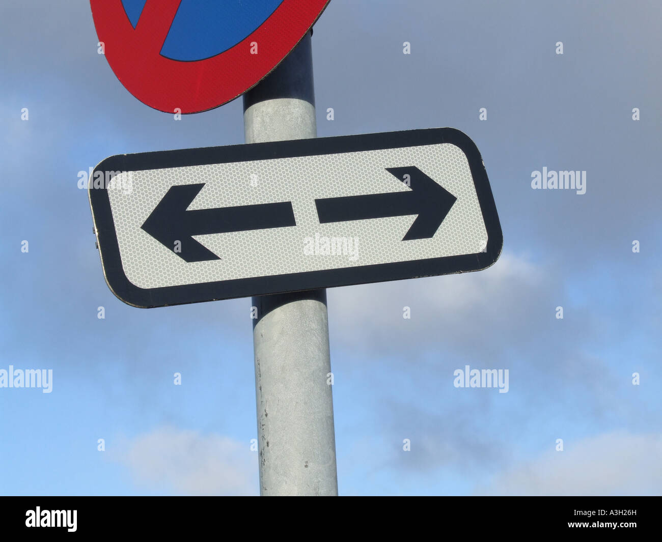 road traffic sign with two arrows Stock Photo - Alamy