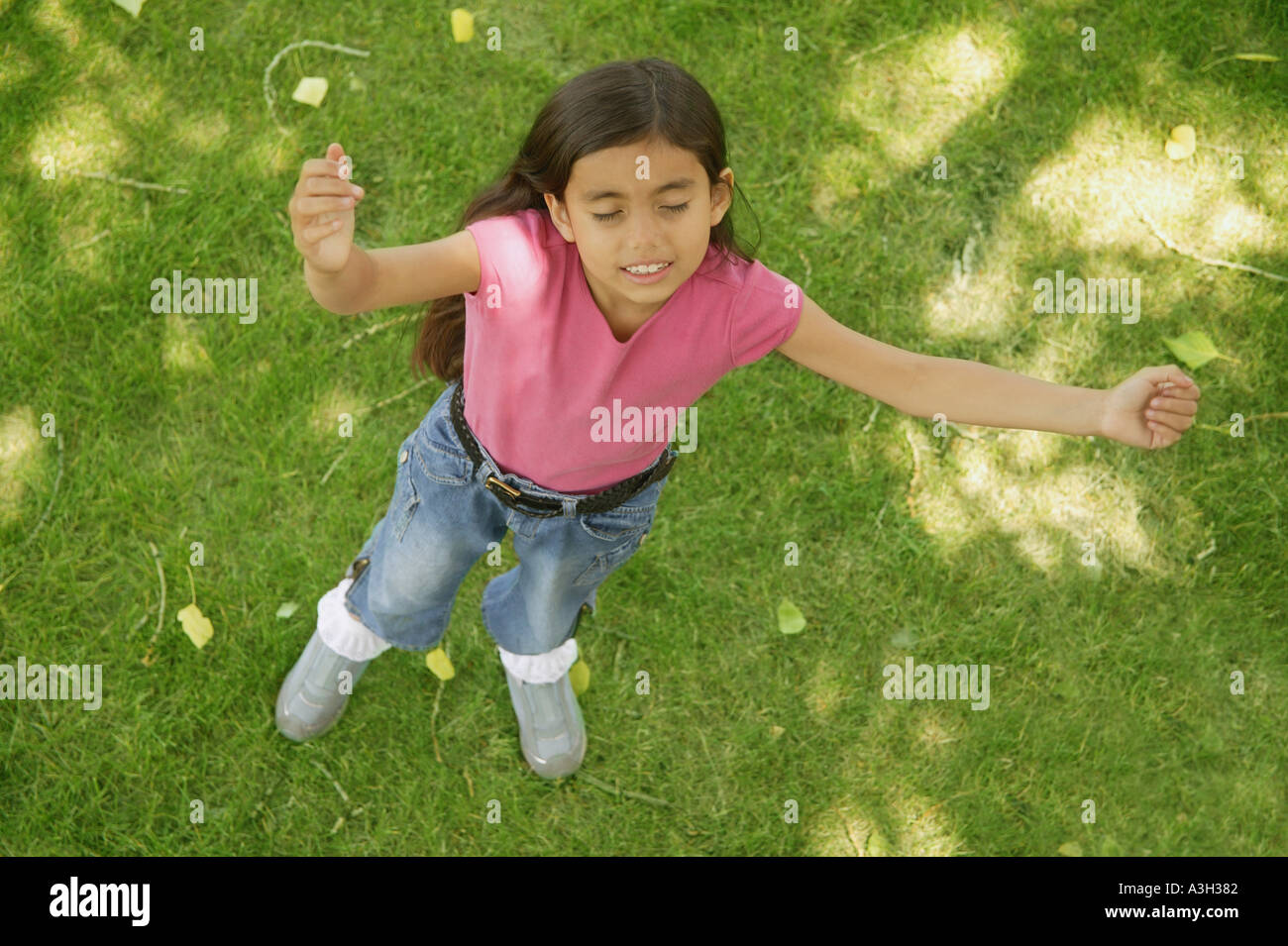 Child arms up prayer hi-res stock photography and images - Alamy