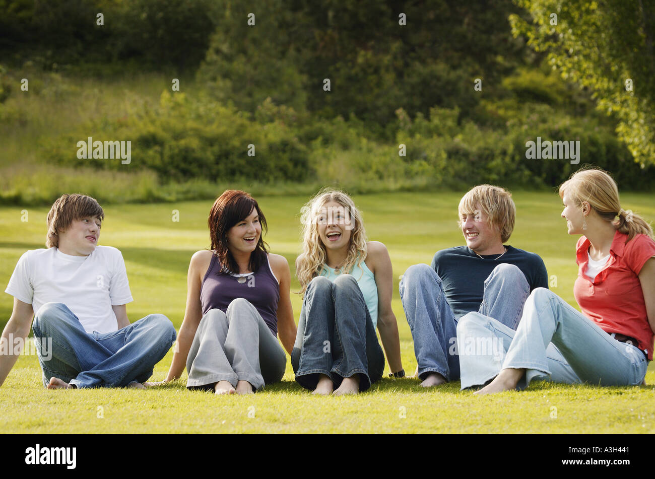 Group teenagers talk laugh hi-res stock photography and images - Alamy