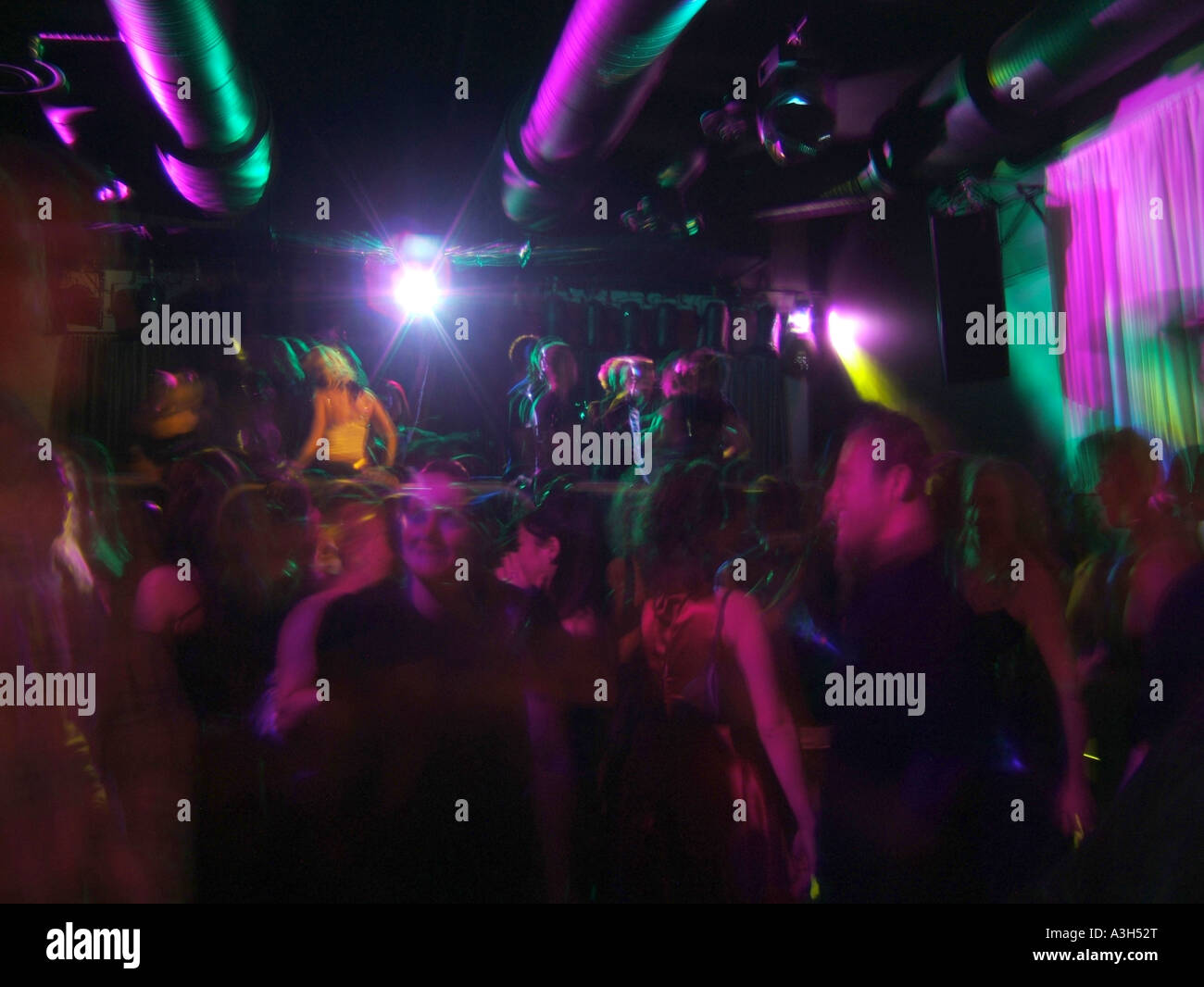 crowd of people dancing in night club Stock Photo - Alamy