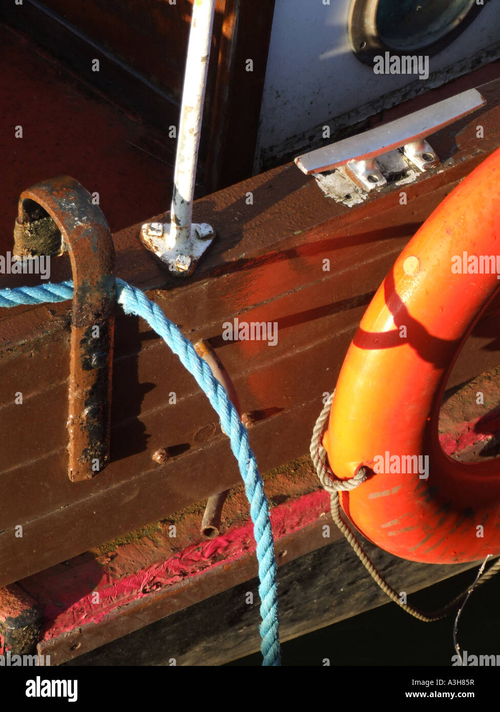 rubber ring on old style boat Stock Photo - Alamy
