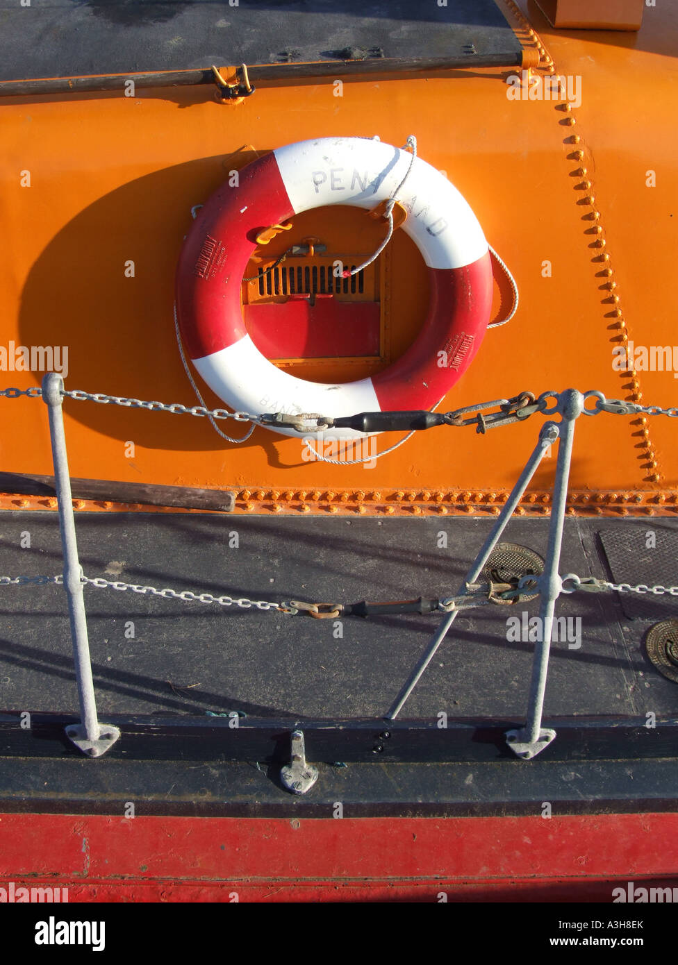 rubber ring on old style lifeboat Stock Photo - Alamy