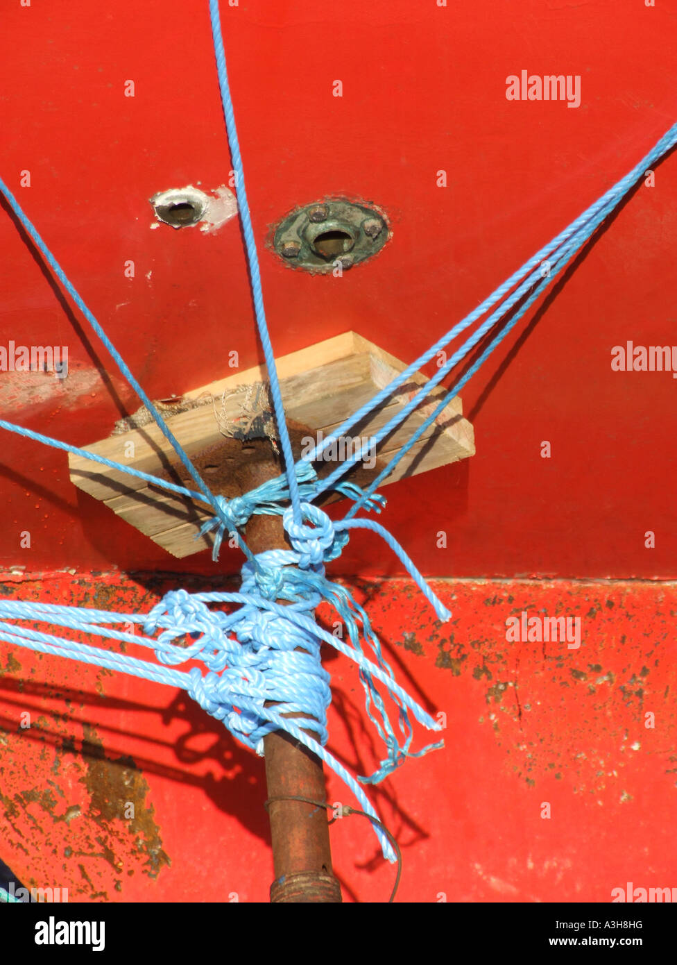 rope and stay supporting boat in dry dock for maintenance overhaul work ...