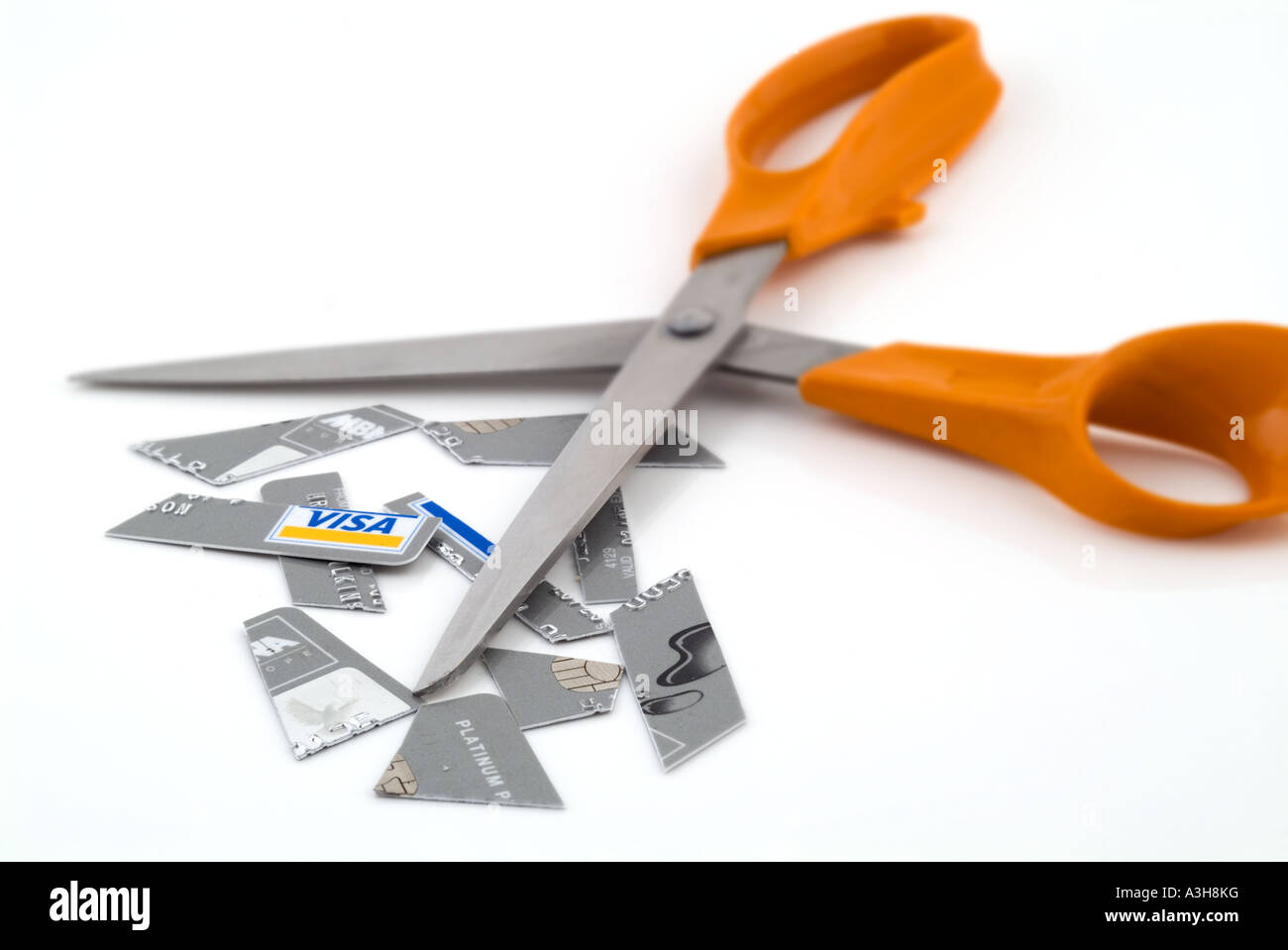 credit card cut into pieces Stock Photo - Alamy