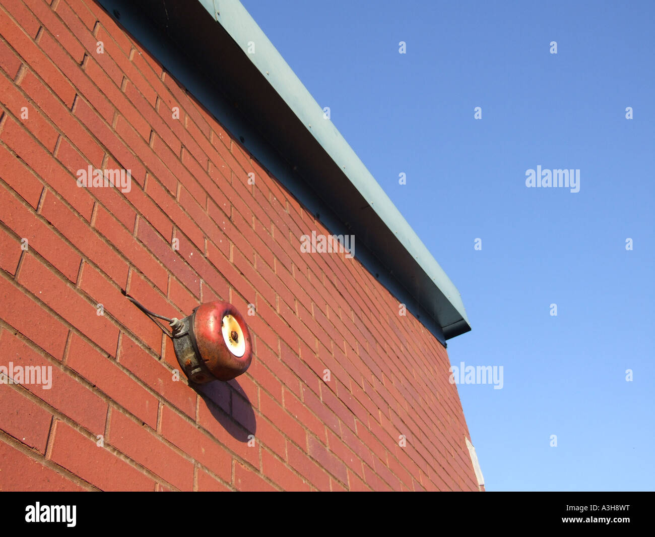 old alarm bell on outside property wall Stock Photo - Alamy