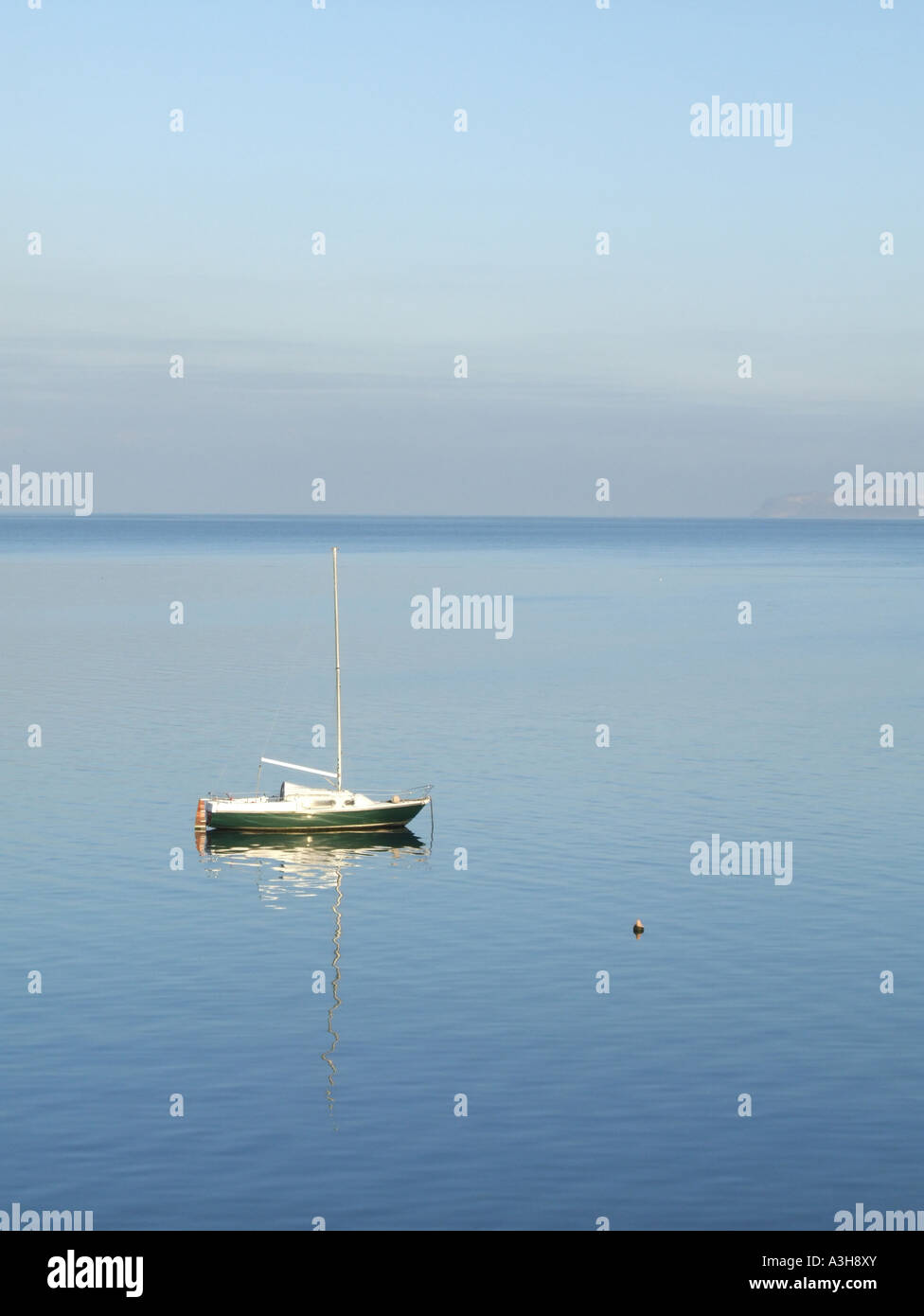 one boat on calm sea Stock Photo - Alamy