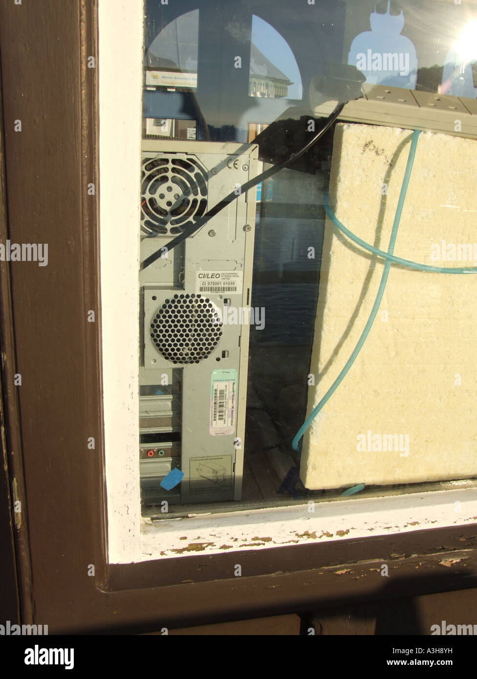 back of computer in window Stock Photo - Alamy