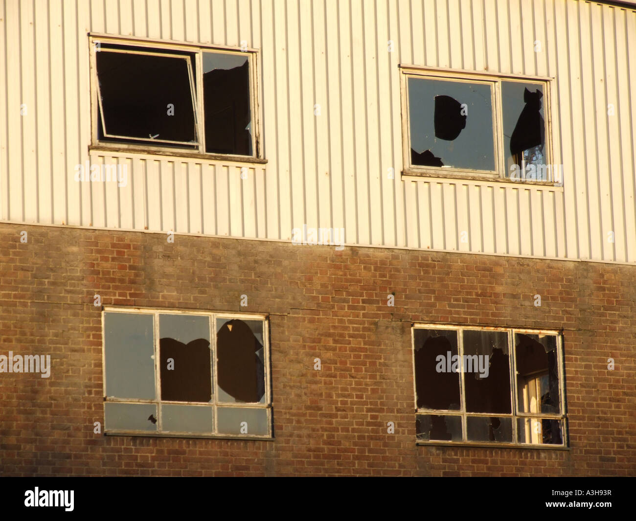 old property with smashed windows Stock Photo - Alamy