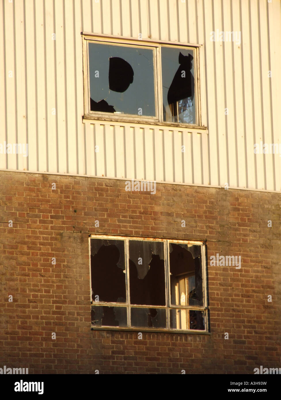 old property with smashed windows Stock Photo - Alamy