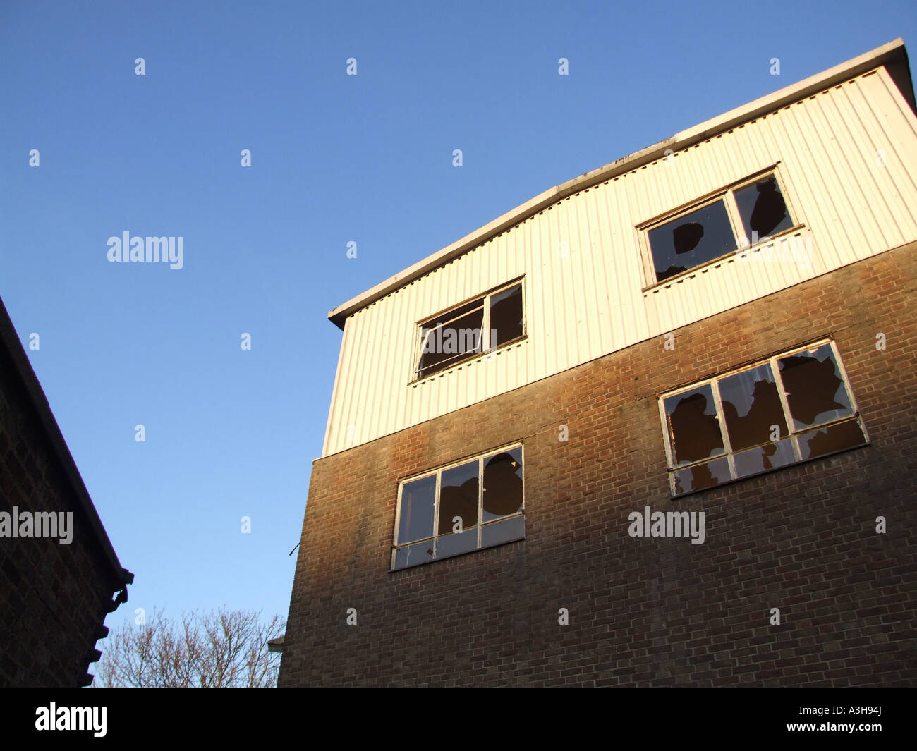 old property with smashed windows Stock Photo - Alamy