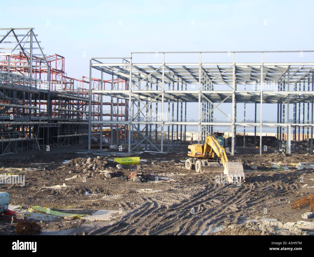 mechanical digger on building site Stock Photo - Alamy