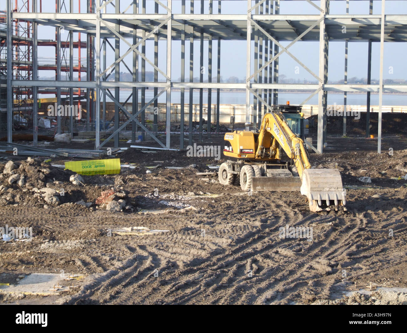 mechanical digger on building site Stock Photo - Alamy
