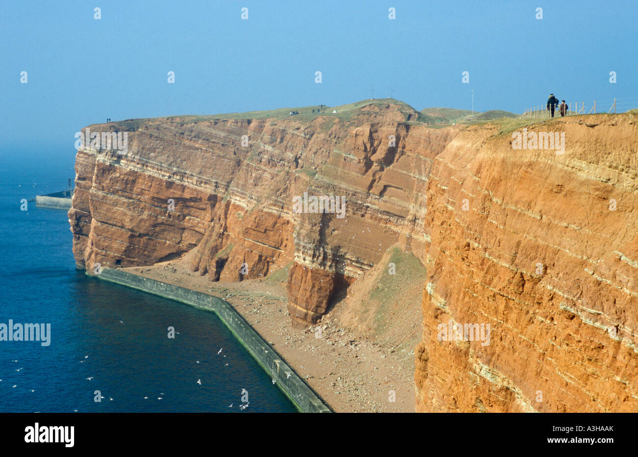 sandstone cliffs on the German island of Helgoland in the North Sea ...