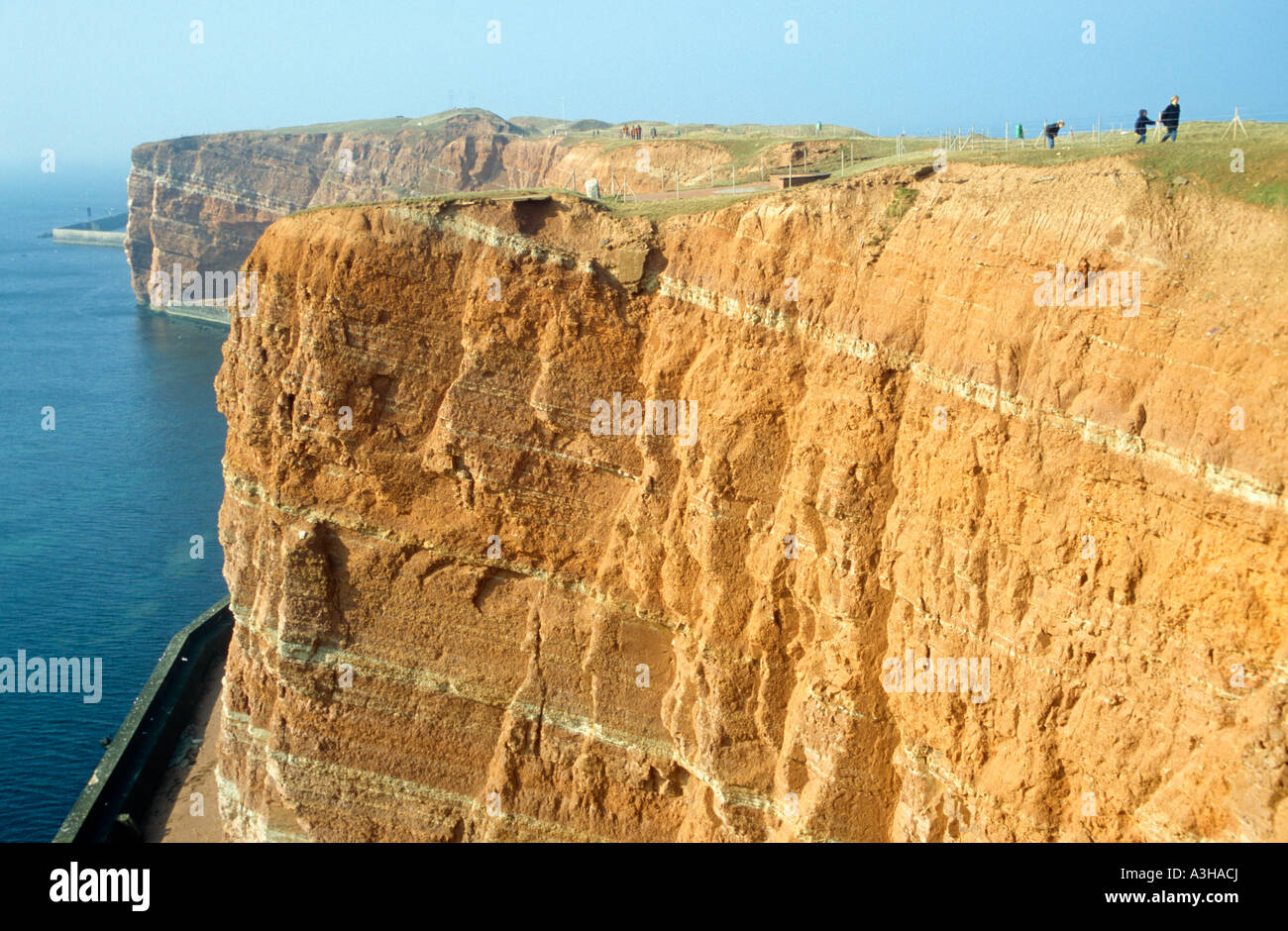 sandstone cliffs on the German island of Helgoland in the North Sea ...