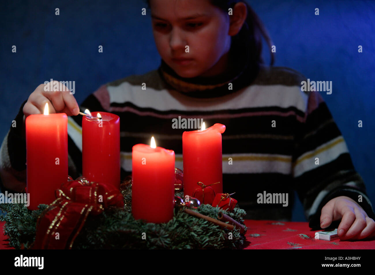 Lighting candles girls hi-res stock photography and images - Alamy