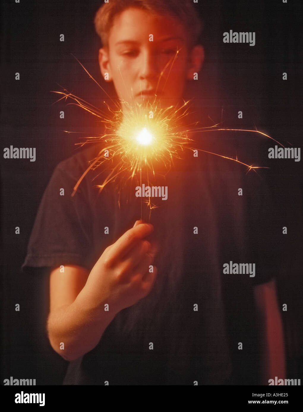 BOY WITH A SPARKLER Stock Photo - Alamy