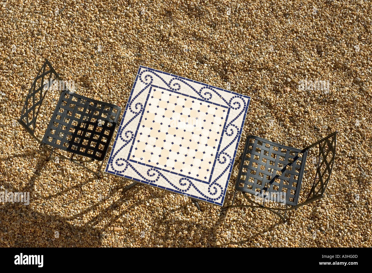 Table in the sunshine Stock Photo - Alamy