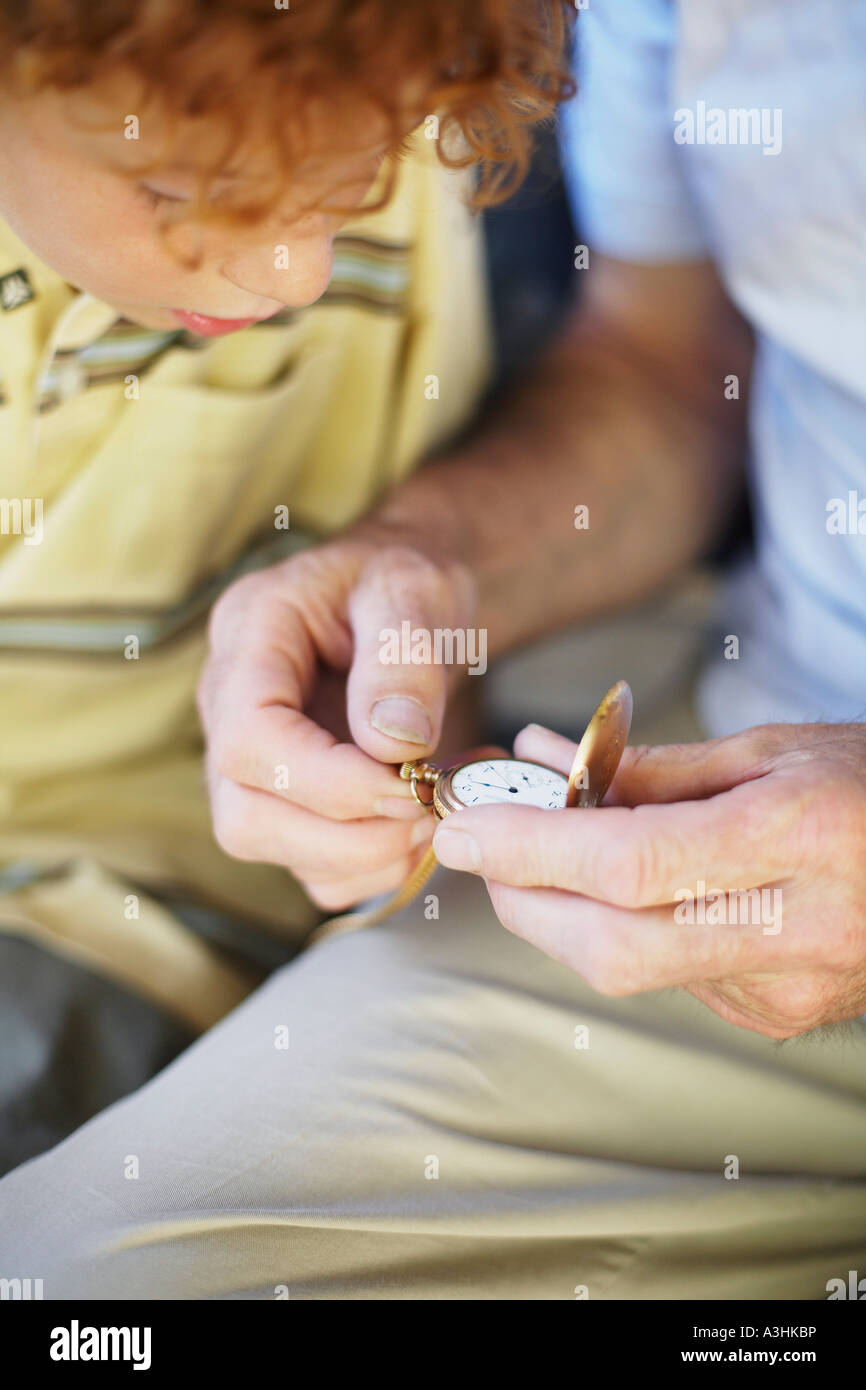 Hand winding pocket watch hi-res stock photography and images - Alamy