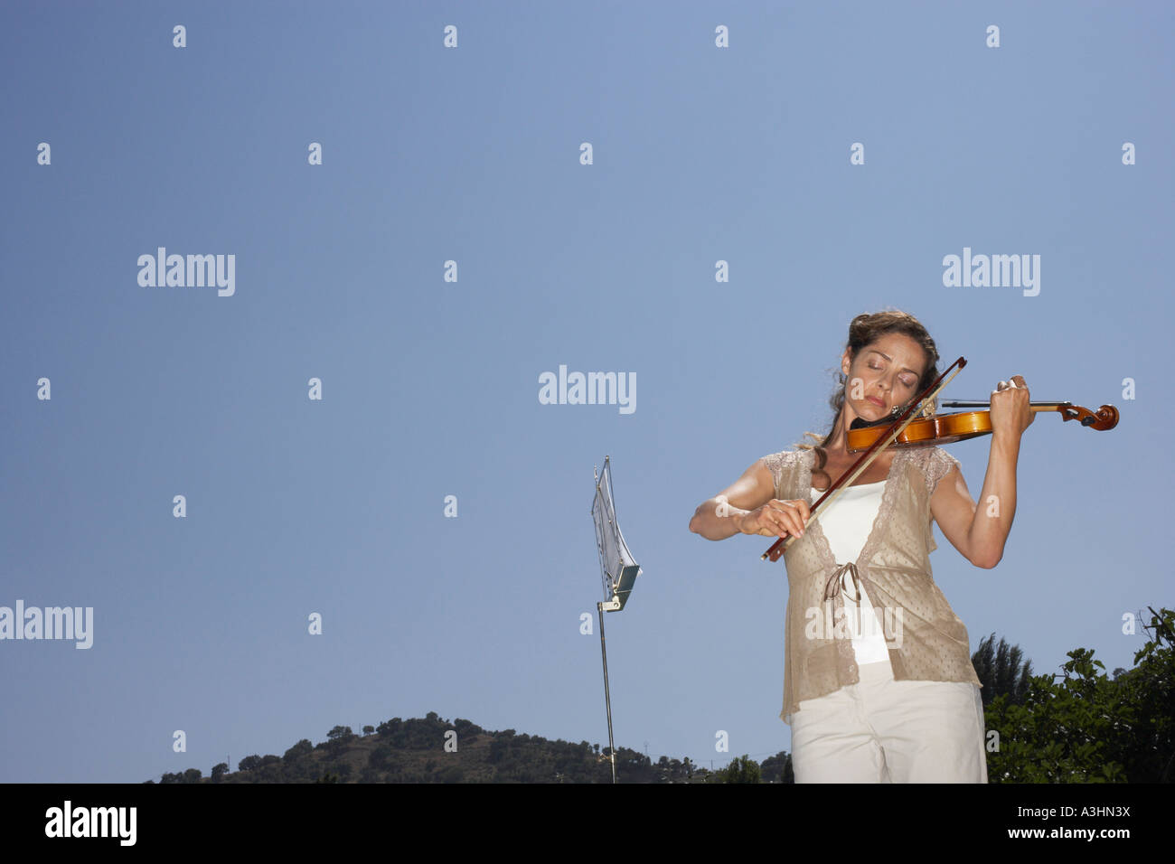 Beautiful Woman Playing Violin High Resolution Stock Photography and ...