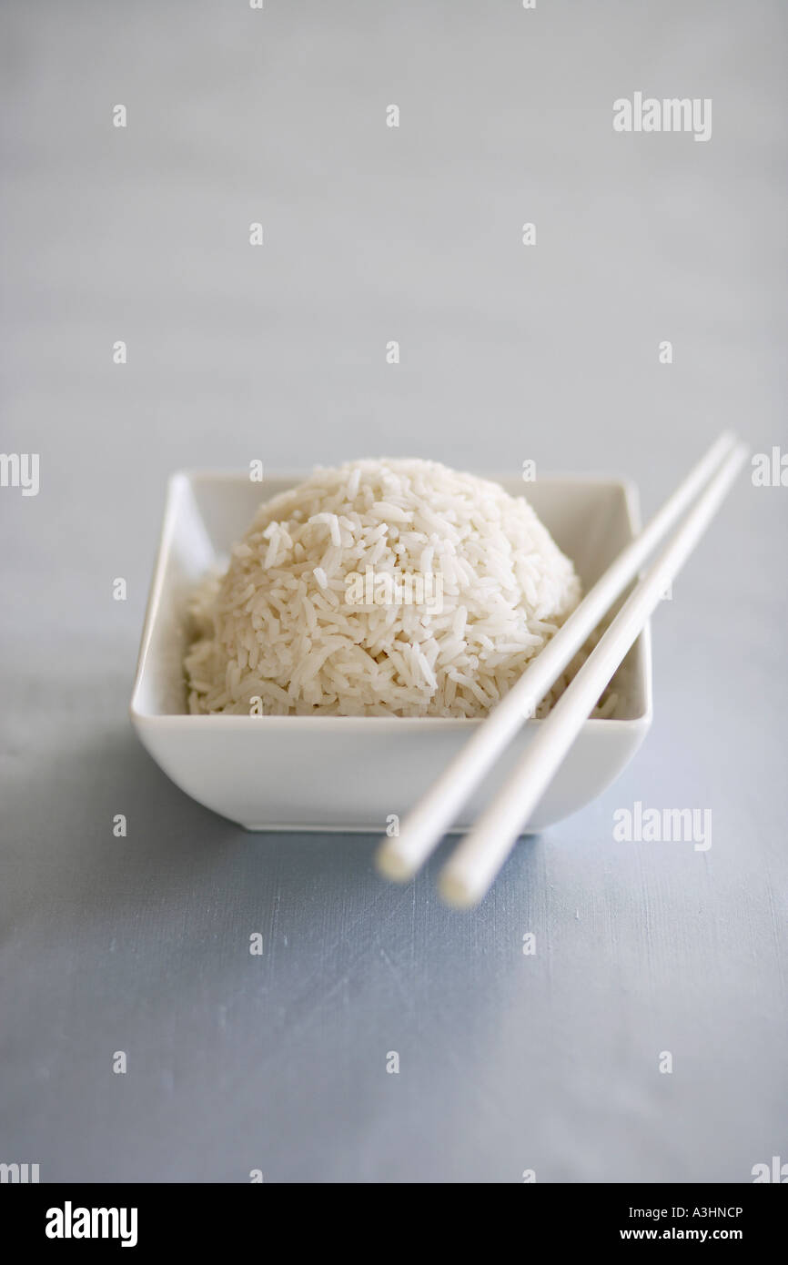 Bowl of Rice with Chopsticks Stock Photo - Alamy