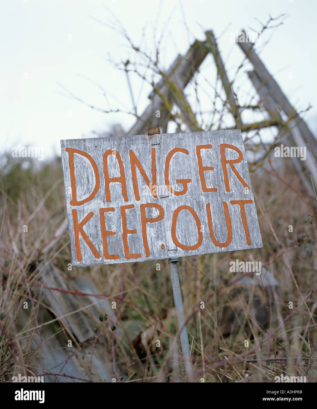 Old danger sign in countryside Stock Photo - Alamy