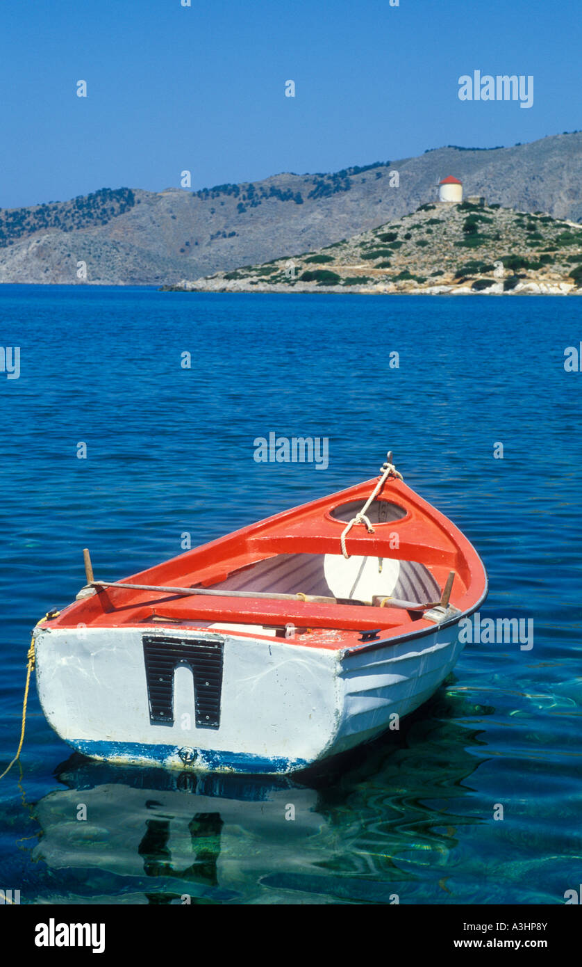 rowing boat at Panormitis Monastery on the Greek Island of Simi in the ...
