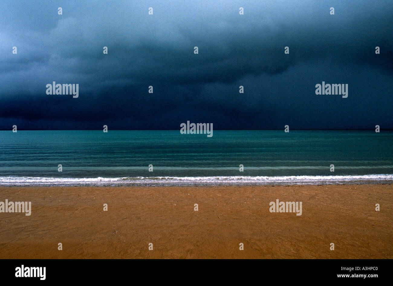 rainfall over sea at morning Stock Photo - Alamy