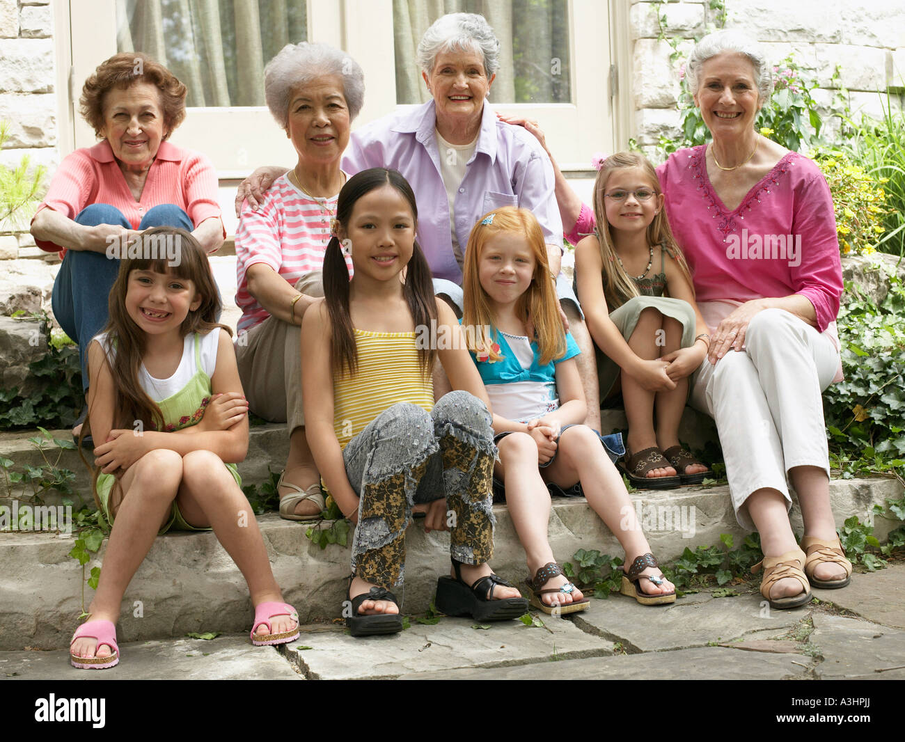 Grandma with child at home terrace hi-res stock photography and images ...