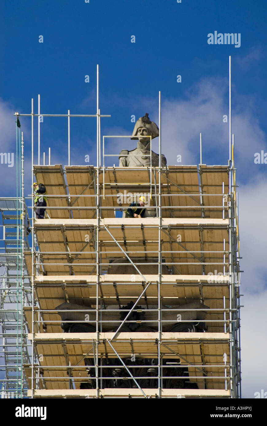 Workman up scaffolding tower hi-res stock photography and images - Alamy