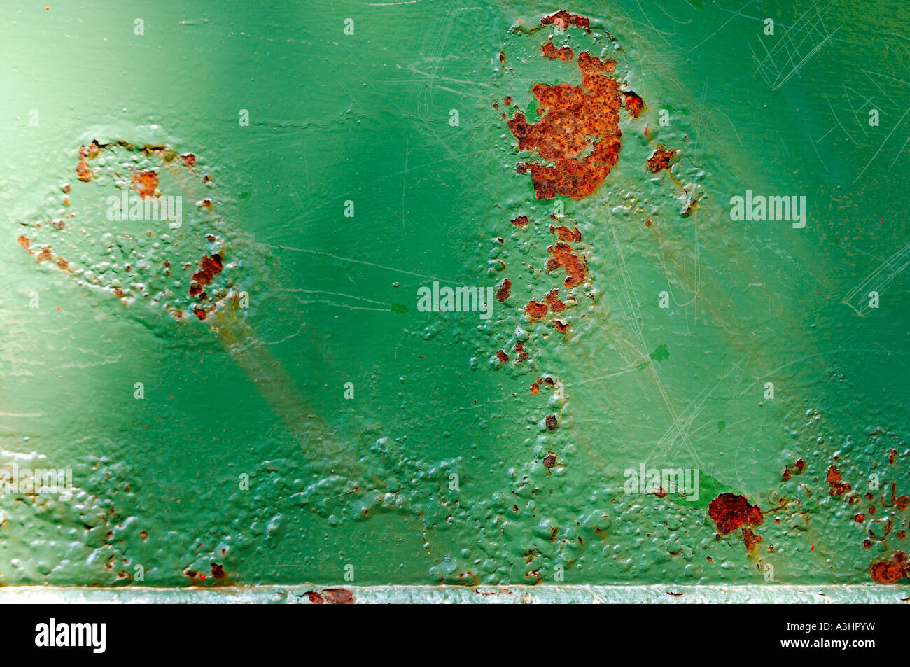 Green metal panel with rust patches Stock Photo - Alamy
