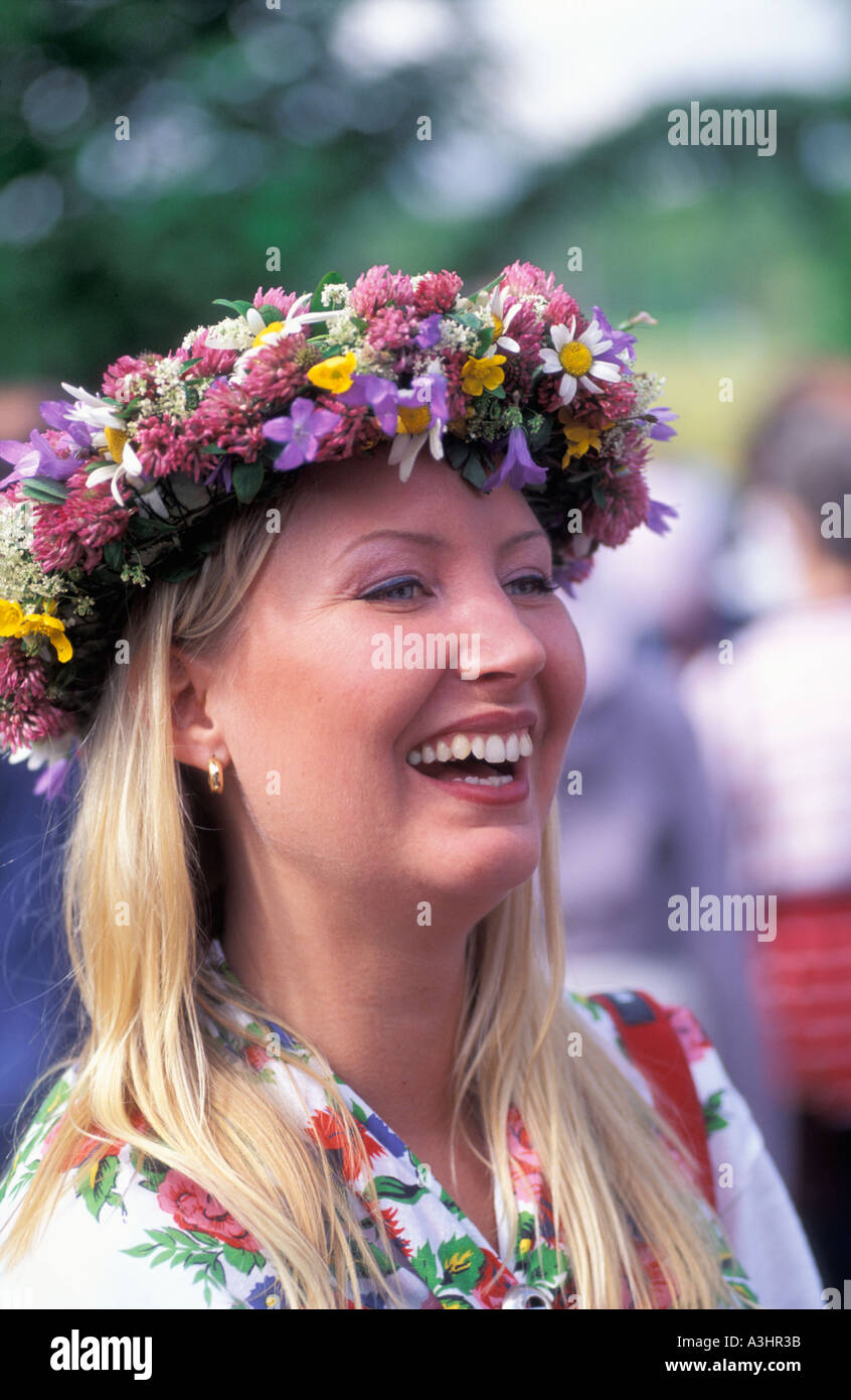 WOMAN WITH FLOWER CROWN MIDSUMMER CELEBRATION SWEDEN Stock Photo - Alamy