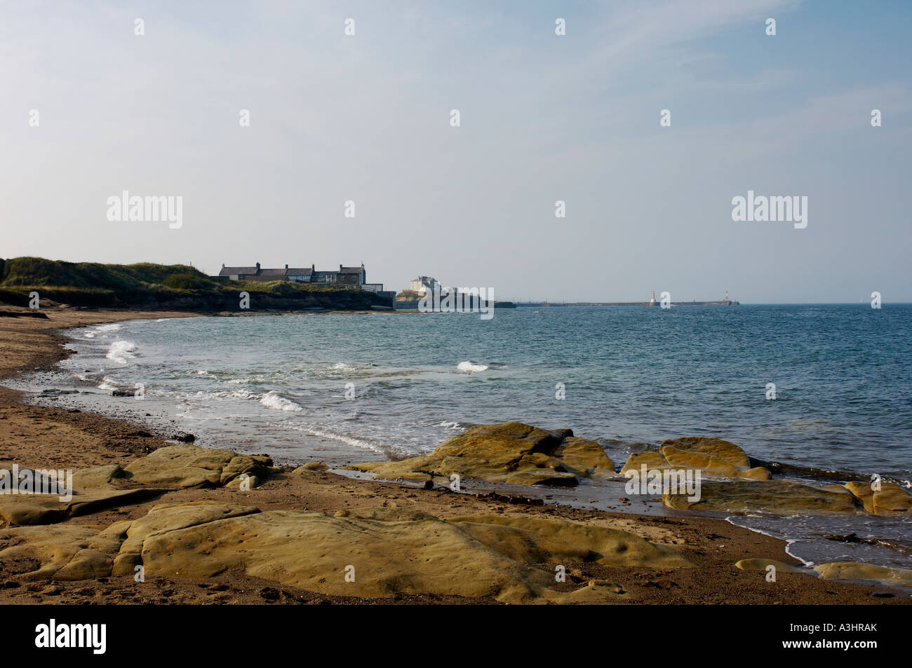 Rocky section of beach along the coastline of Amble, Northumberland. UK ...