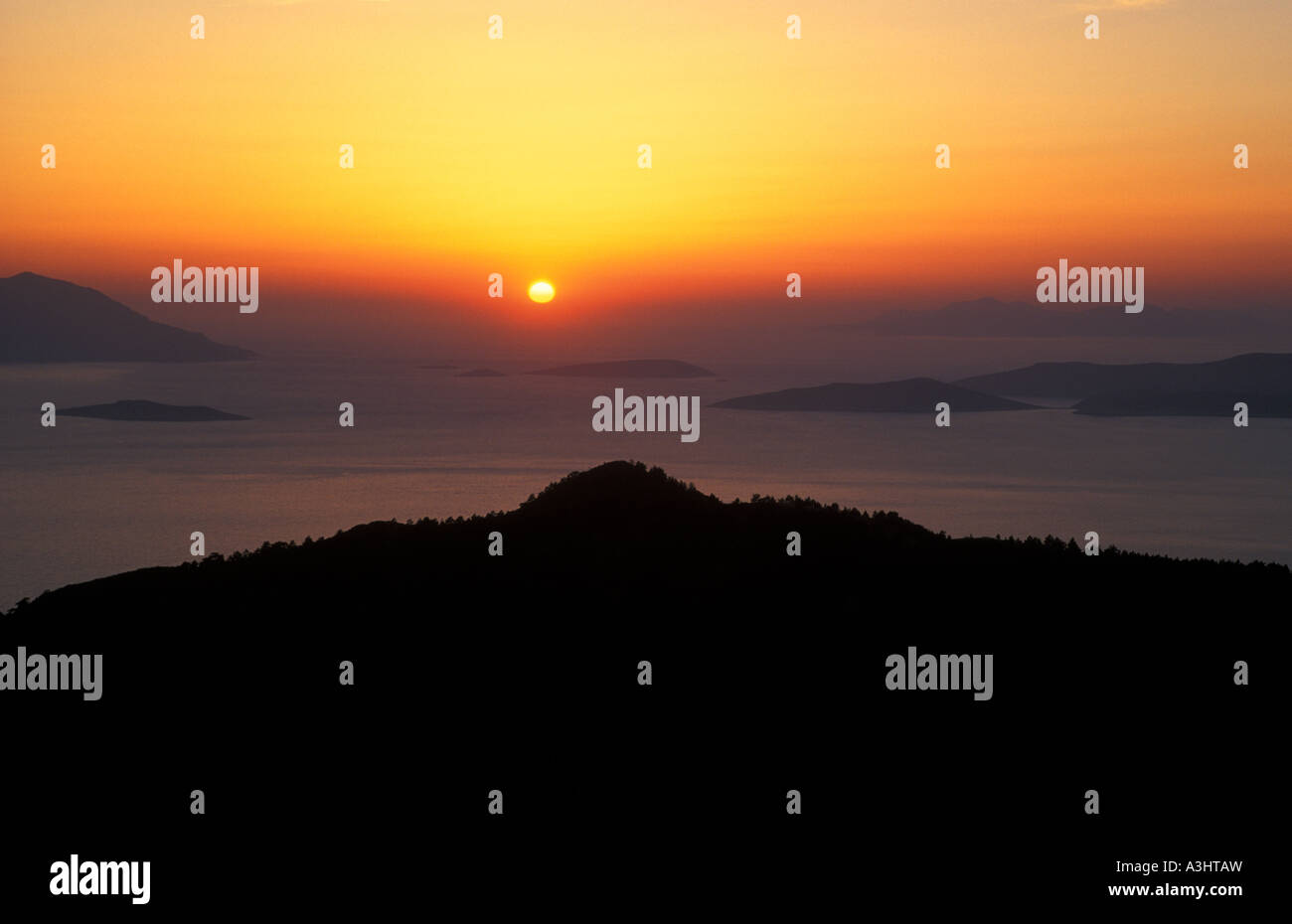 sunset above the Aegean Sea seen from the Greek Island of Rhodes Stock ...