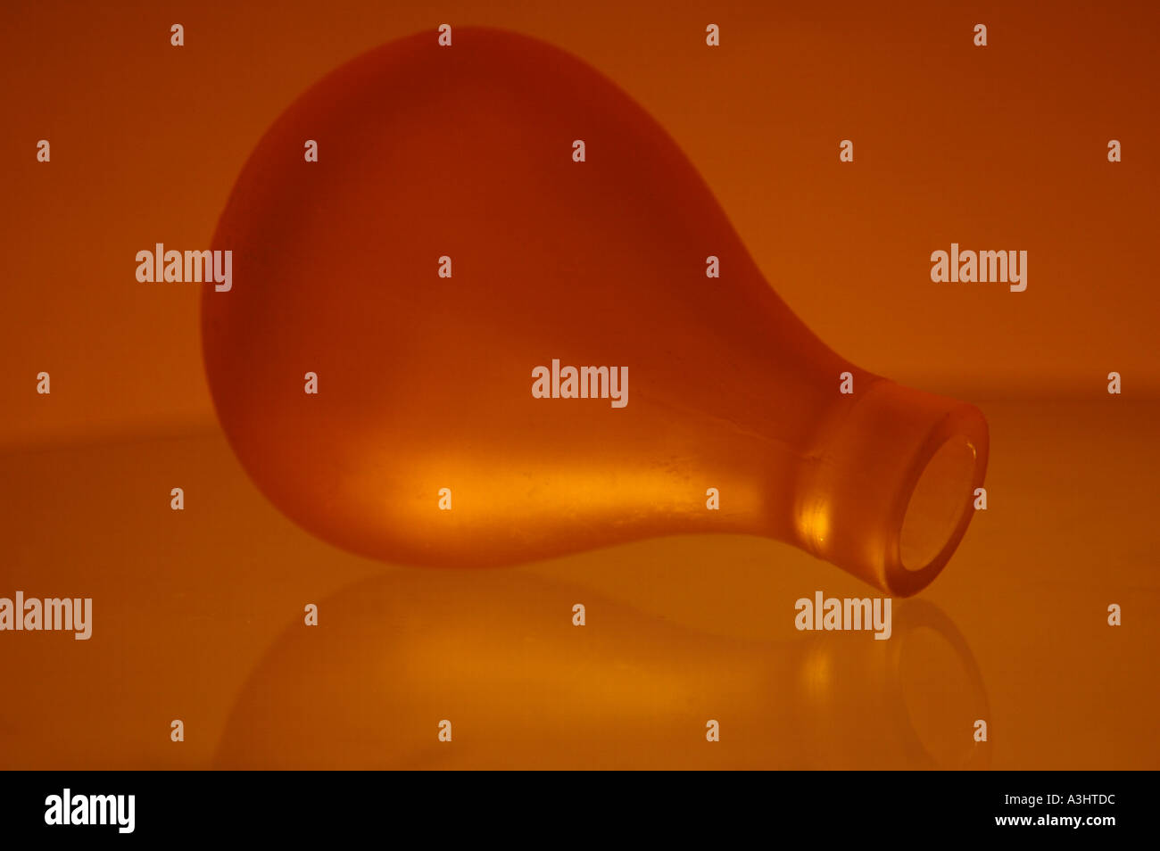 Yellow glass bottle Stock Photo - Alamy