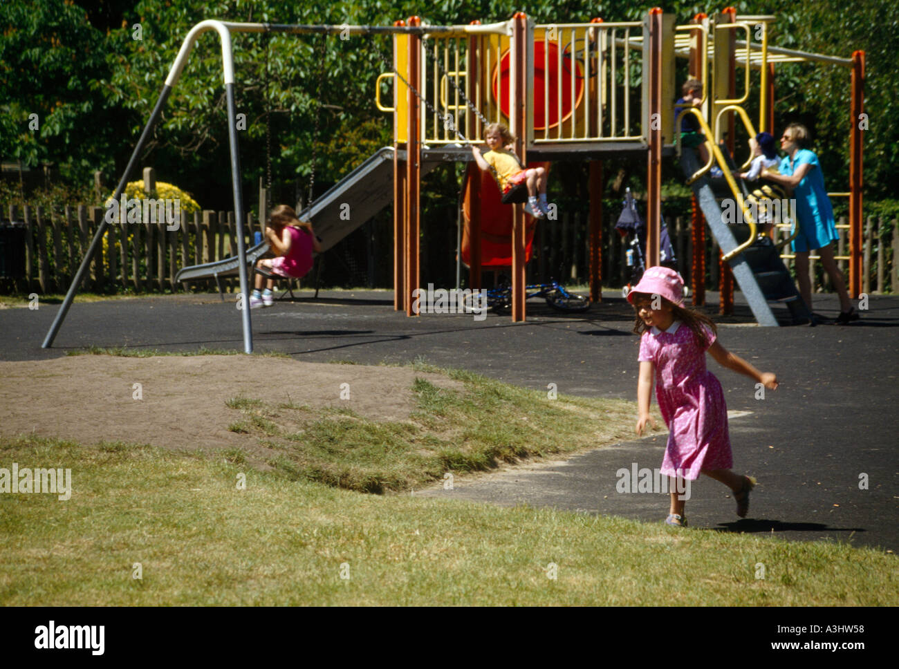 Child Running Across Playground Cheam Park Cheam Surrey Stock Photo - Alamy