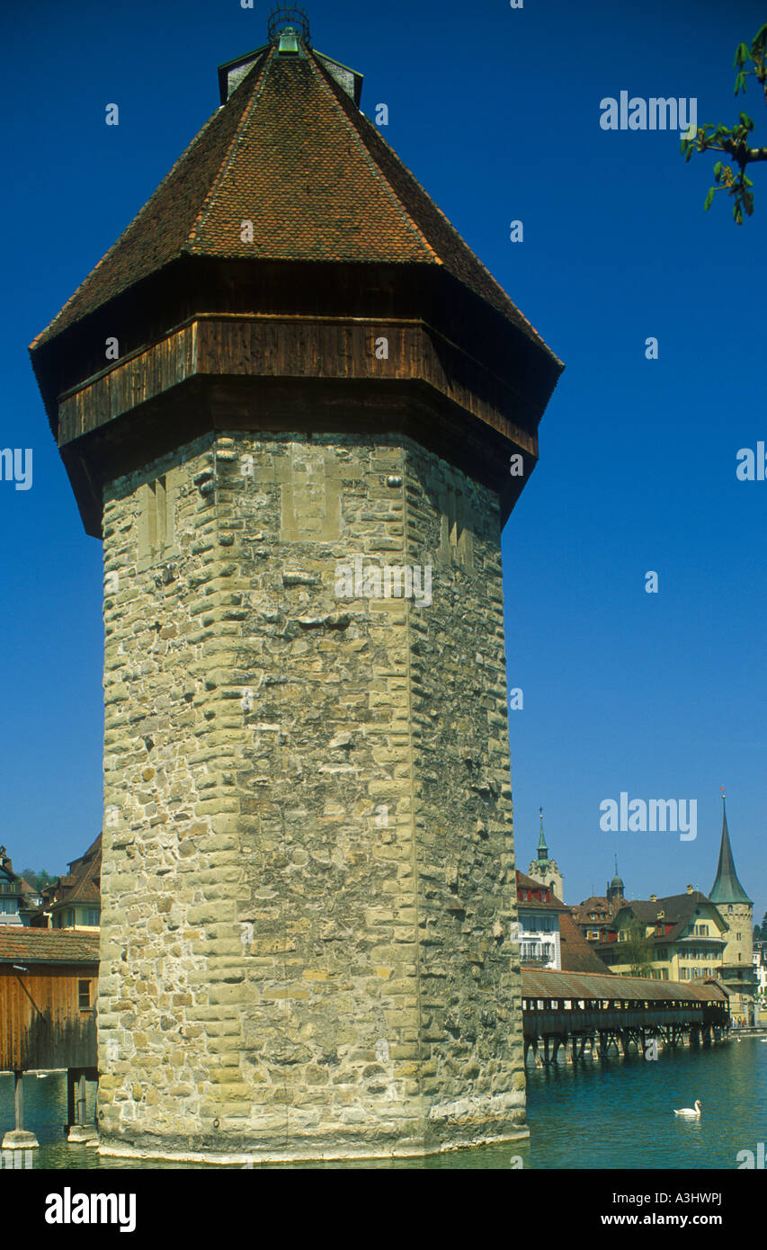 the water tower of the Chapel Bridge across Lake Lucerne in Lucerne in ...