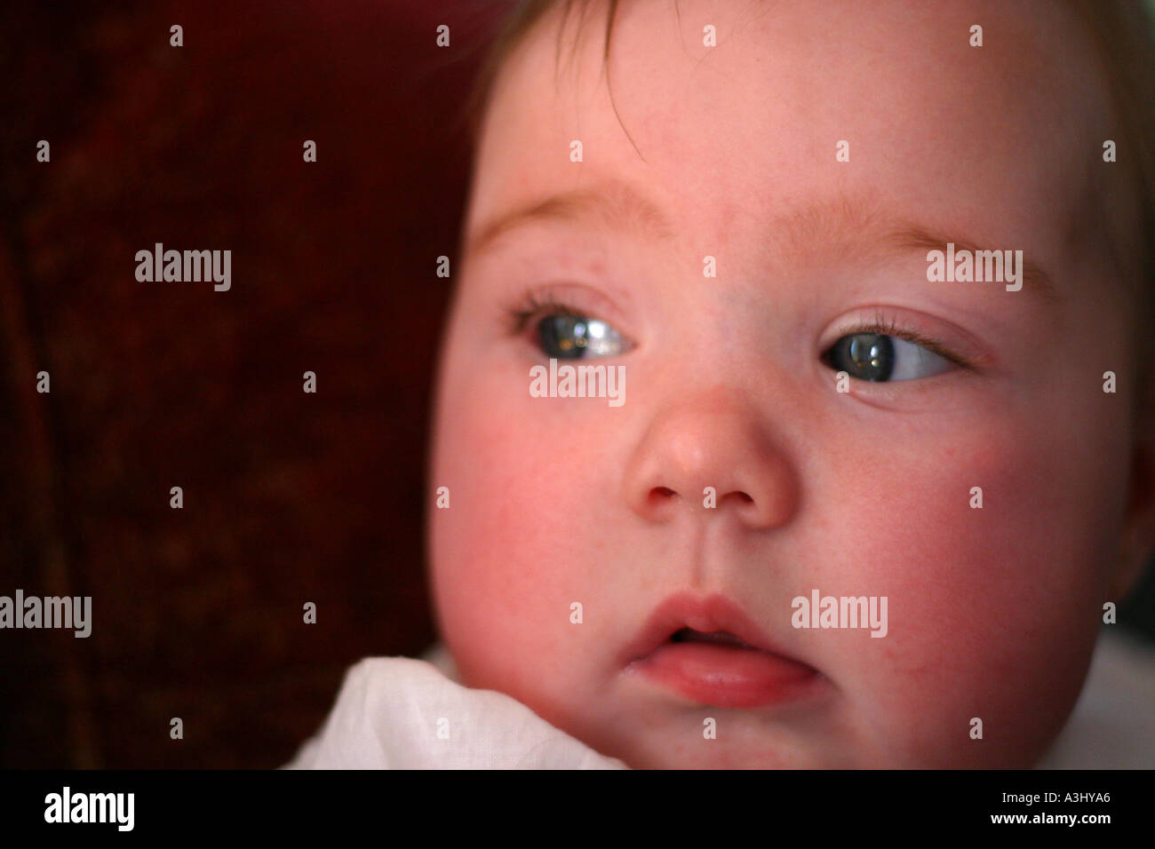 baby looking troubled Stock Photo - Alamy