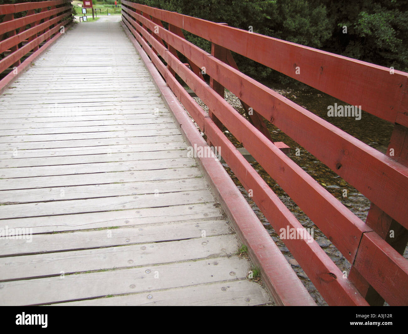 Wooden vehicle and foot bridge Stock Photo - Alamy